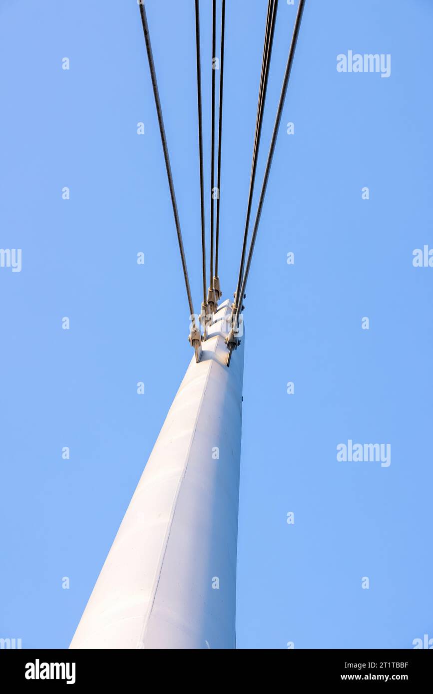 Bridgehead sloping made of metal with steel cables of a suspension ...