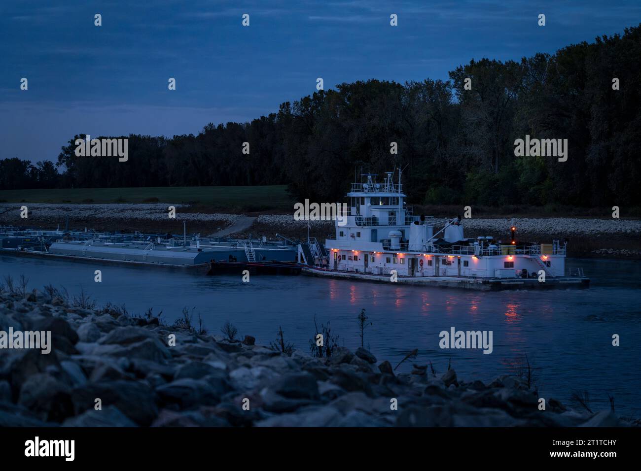 towboat with barges on Chain of Rock Bypass Canal of Mississipi River ...