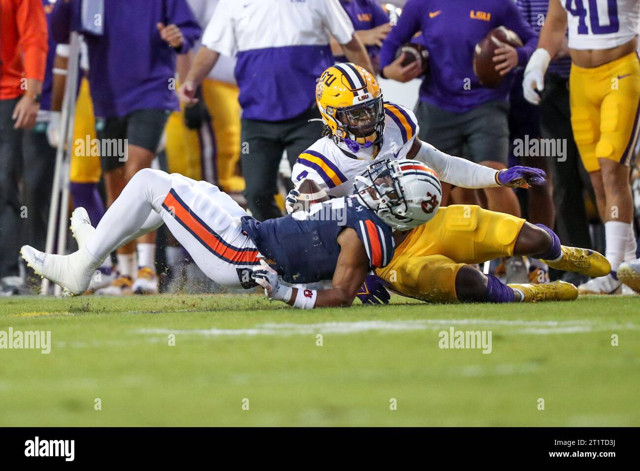 October 14, 2023: LSU linebacker Harold Perkins Jr. (4) brings down ...