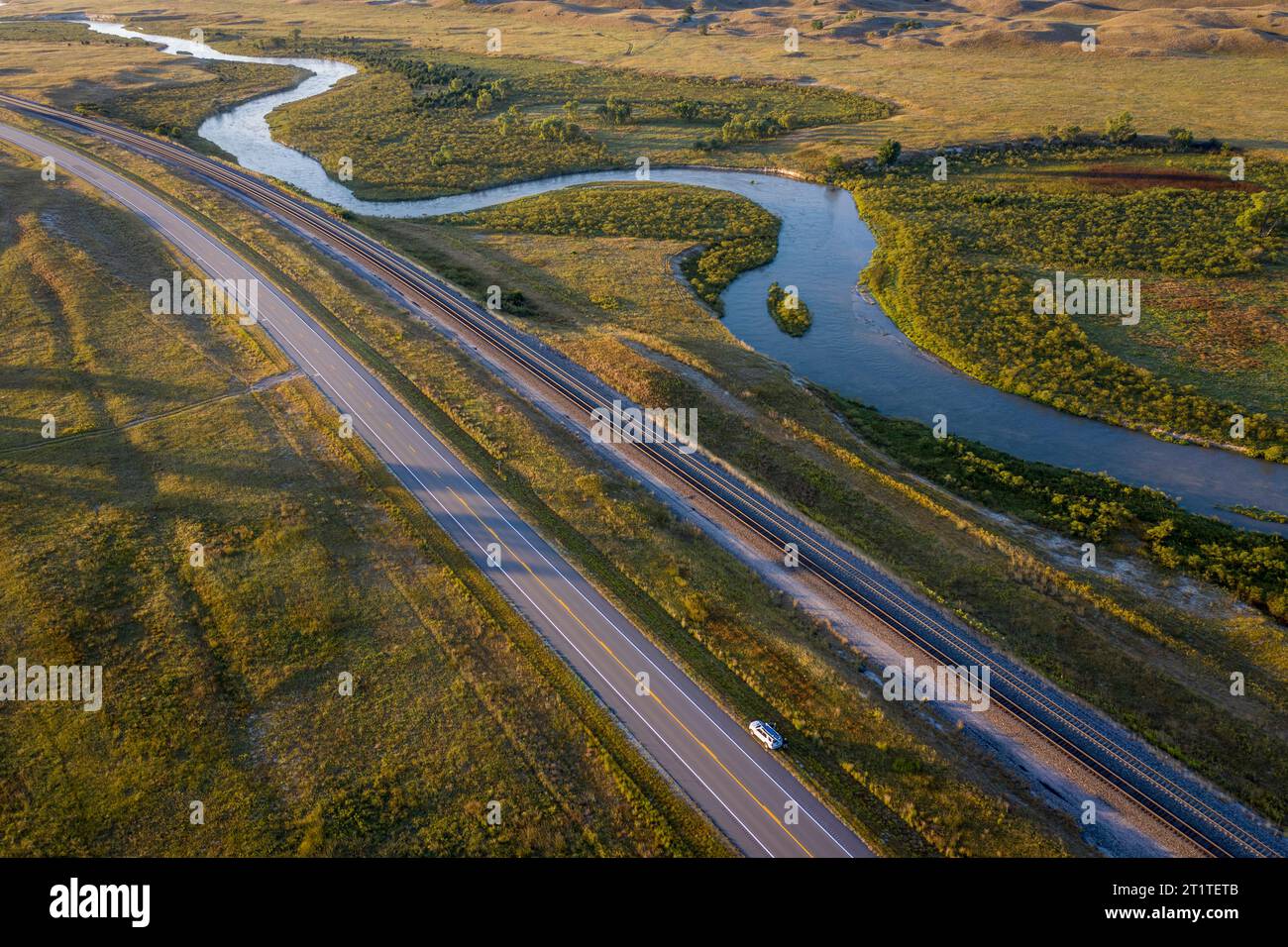highway and railroad along the Middle Loup River in Nebraska Sandhills ...