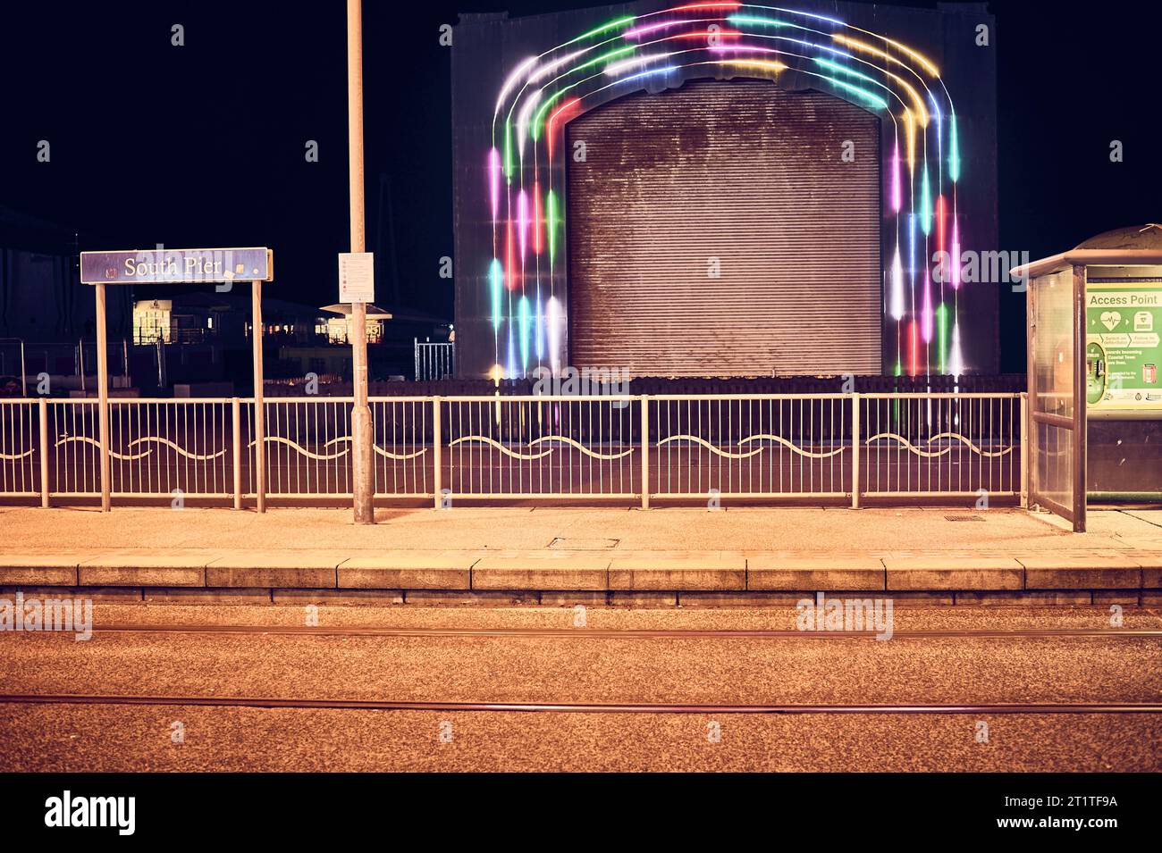 Empty tram stop on a quite night during Blackpool illuminations Stock ...