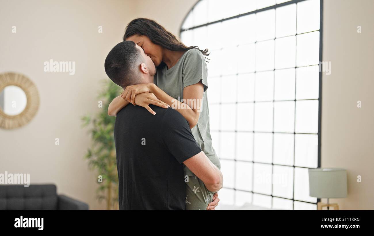 Passionate couple kissing bedroom hi-res stock photography and images ...