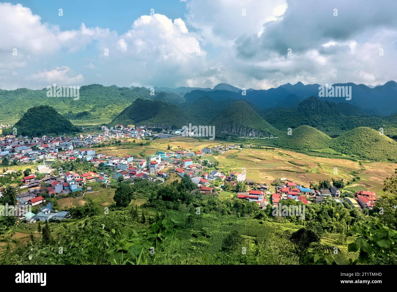 View of the Twin Mountains and limestone karst plateau from Quan Ba ...