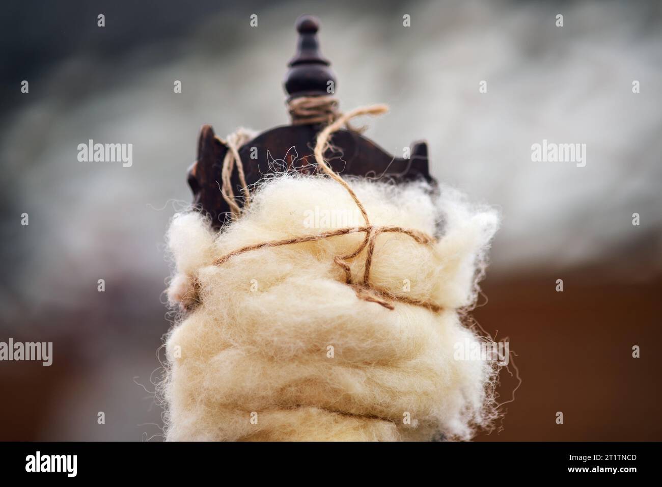 The spinning process involves twisting the fibers of the wool together ...