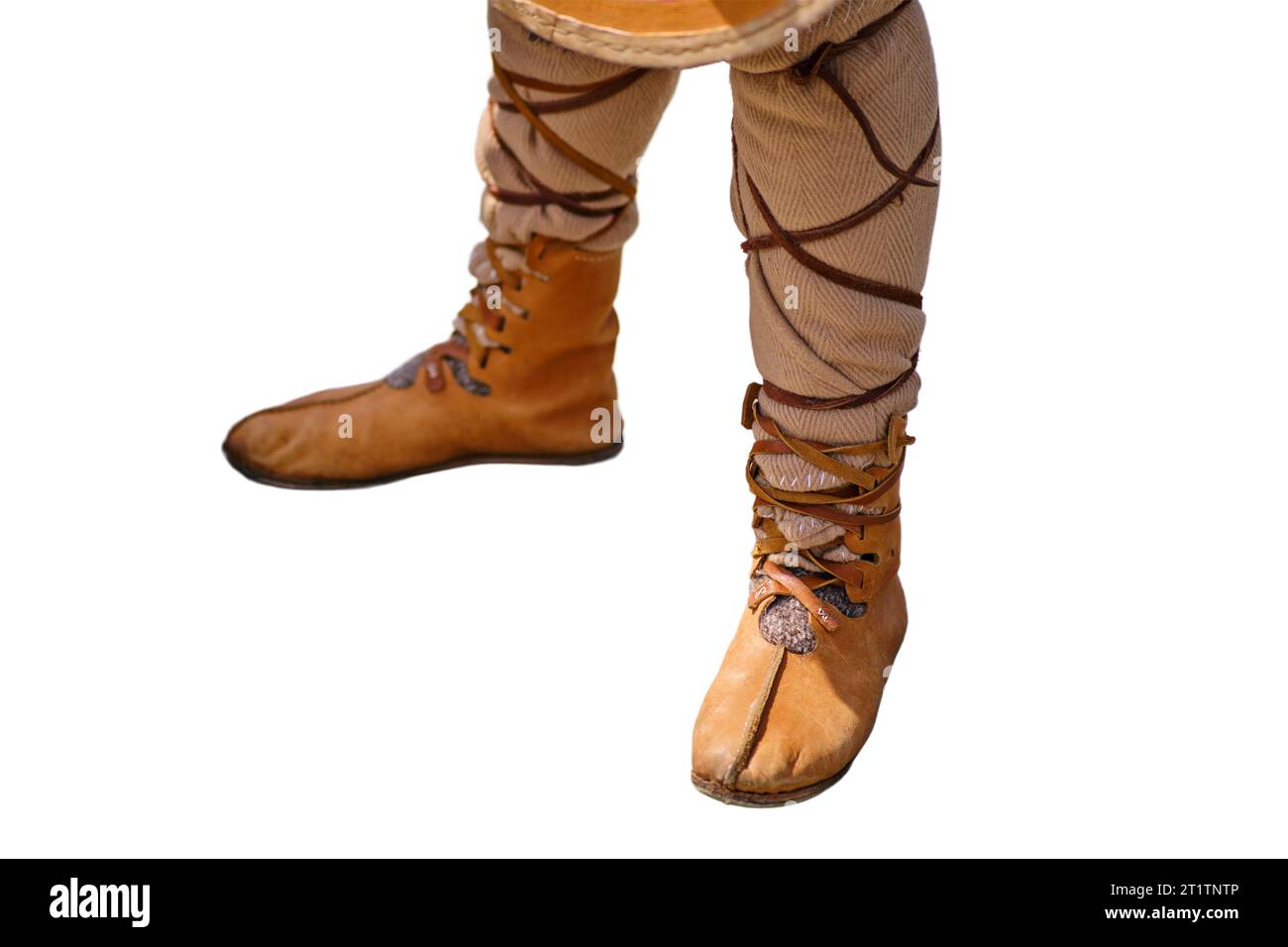 Feet in shoes of the ancient Roman war, soldiers in historical boots on ...