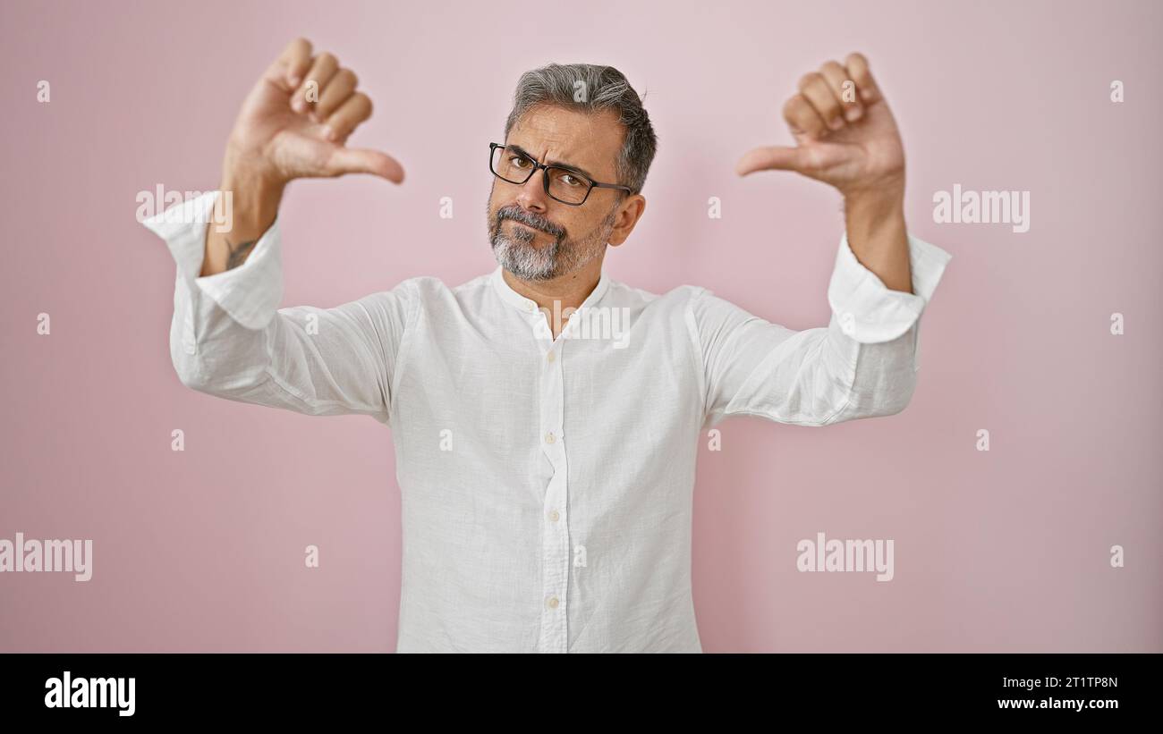 Grey haired hispanic man doing hi-res stock photography and images - Alamy