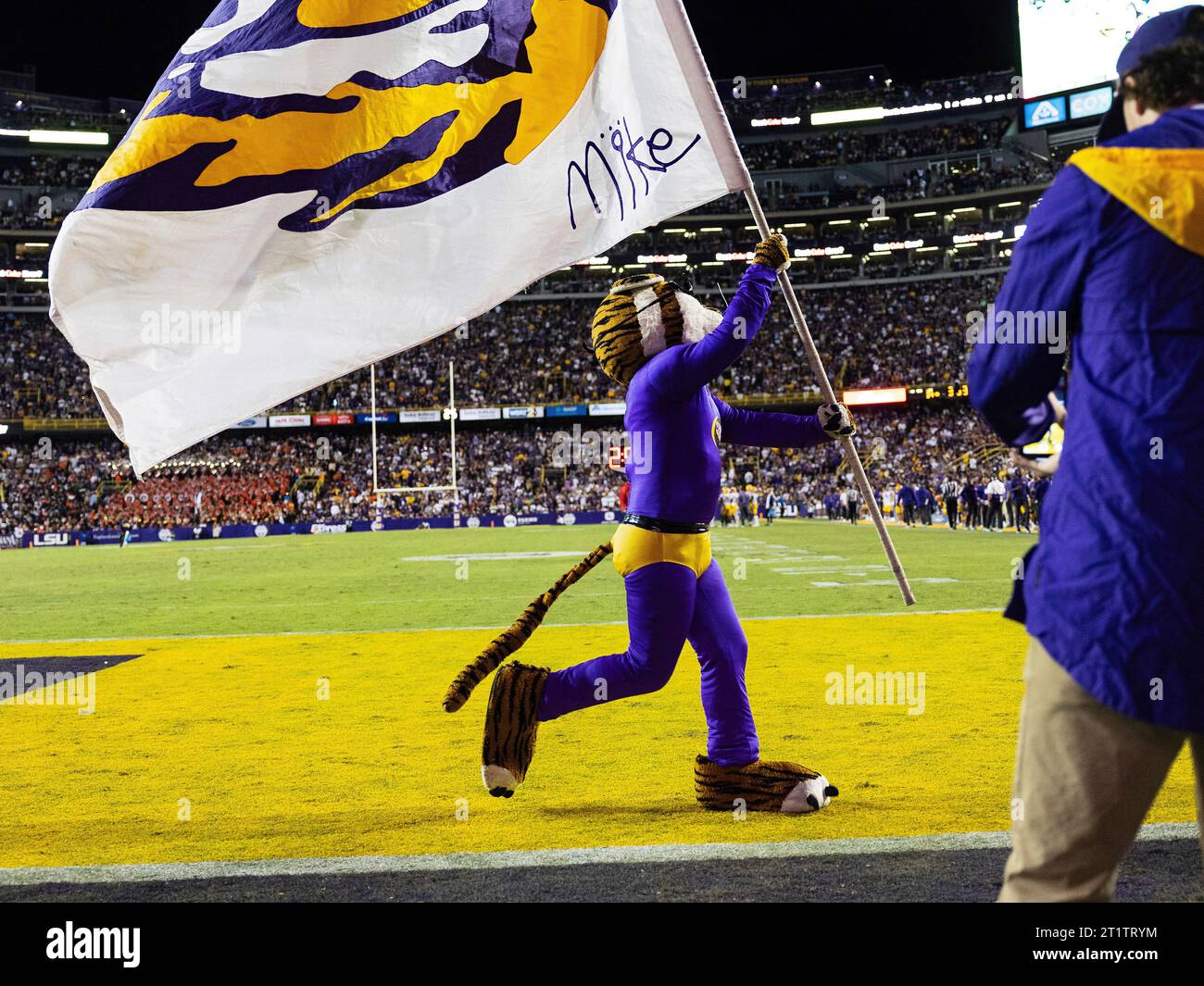 BATON ROUGE, LA - OCTOBER 14: Mike the Tiger runs the school flag ...