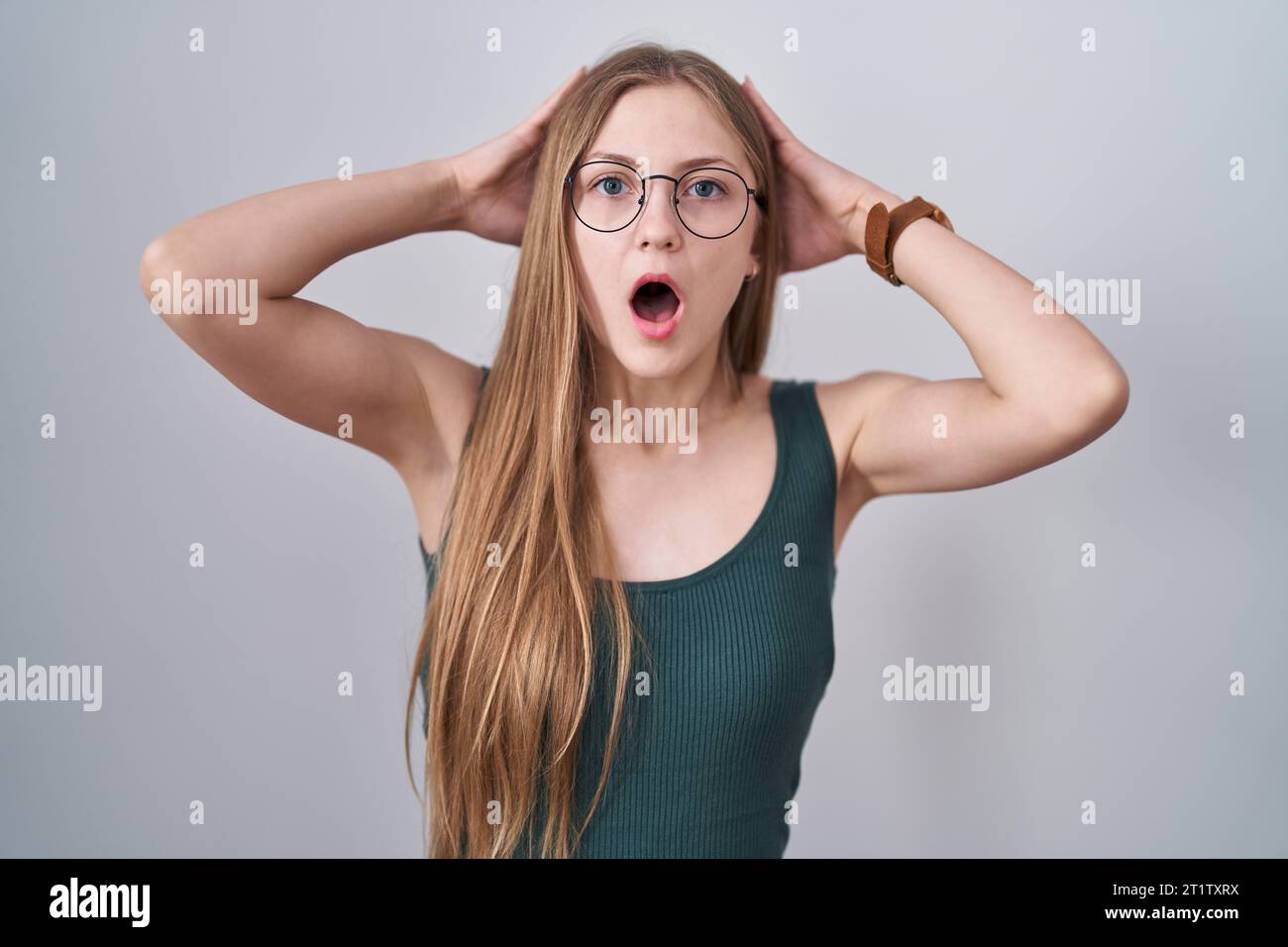 Young Caucasian Woman Standing Over White Background Crazy And Scared