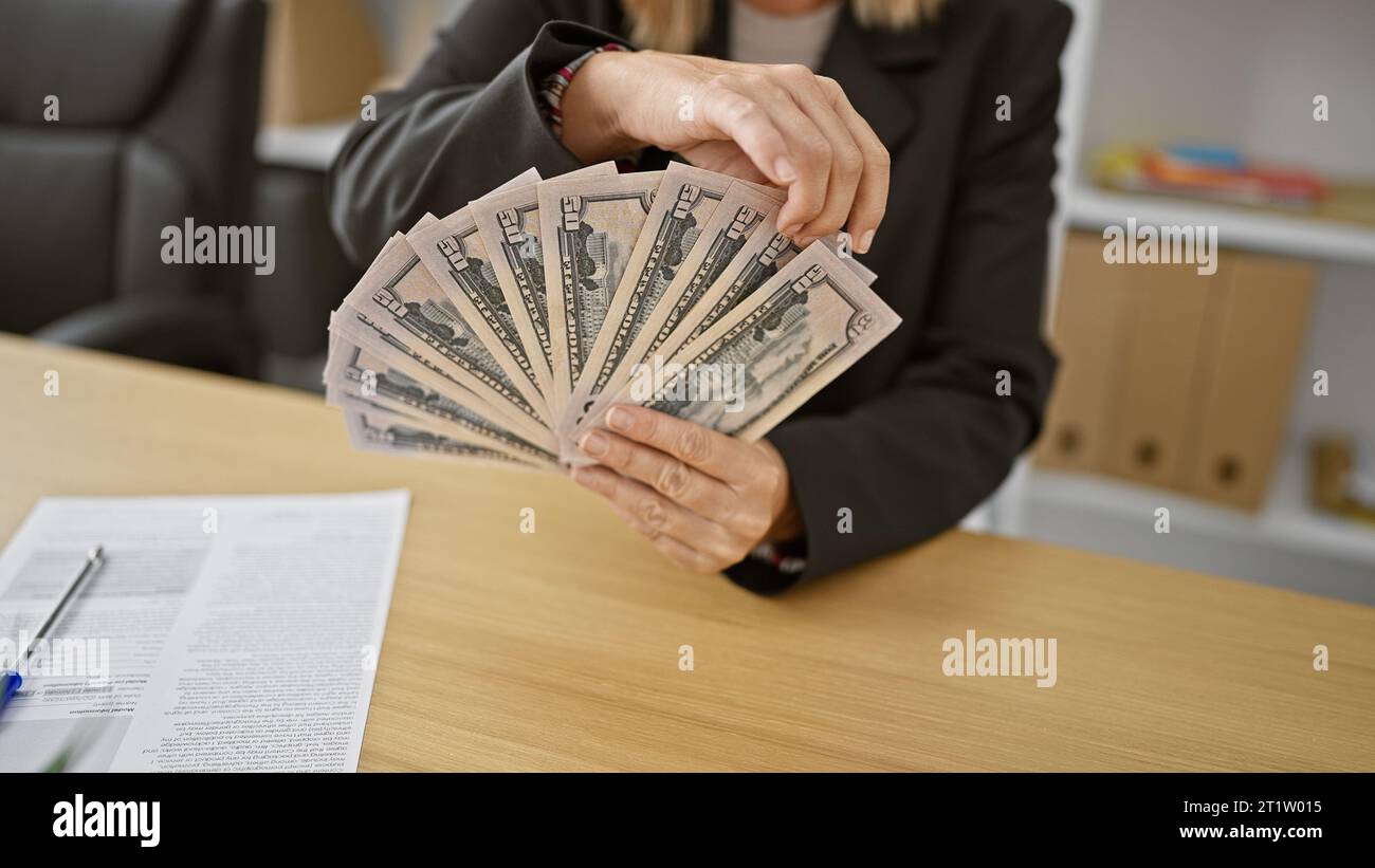 Professional business woman's hands skillfully counting dollars at ...