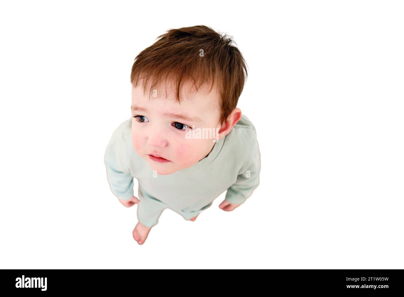 Little baby whimpers and is naughty, isolated on white background ...