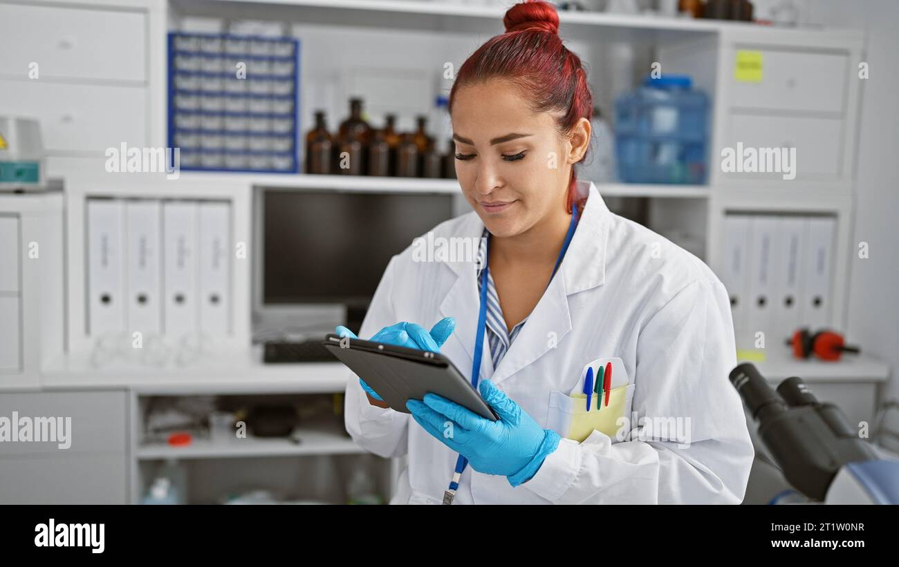 Smiling young redhead scientist woman delightfully making strides in ...