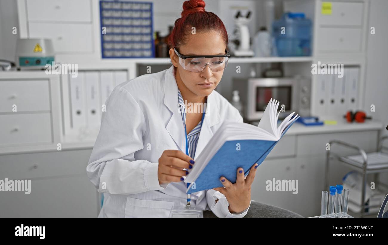 Chemist in research center studying hi-res stock photography and images ...