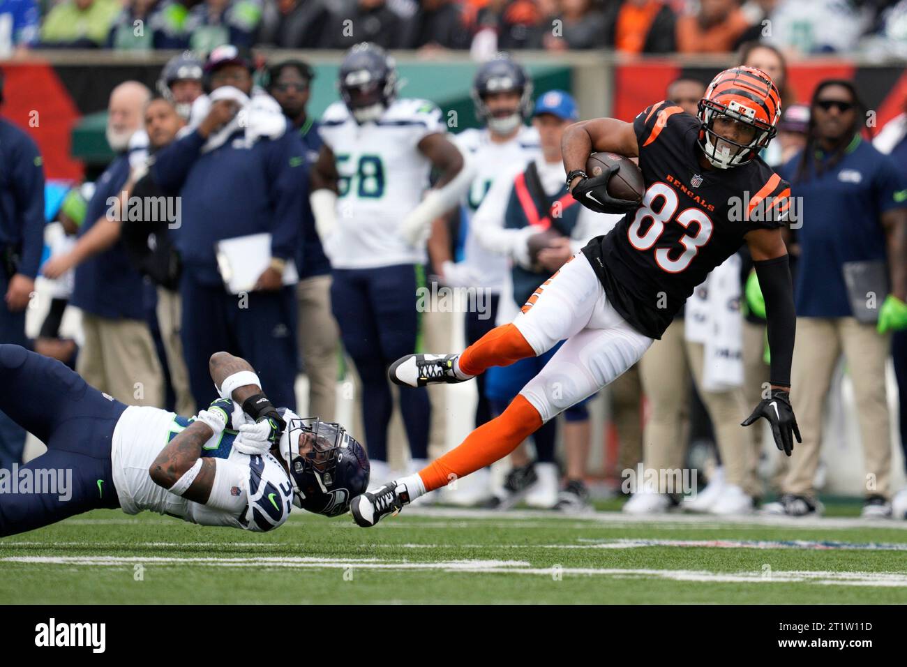 Cincinnati Bengals' Tyler Boyd (83) is tackled by Seattle Seahawks ...