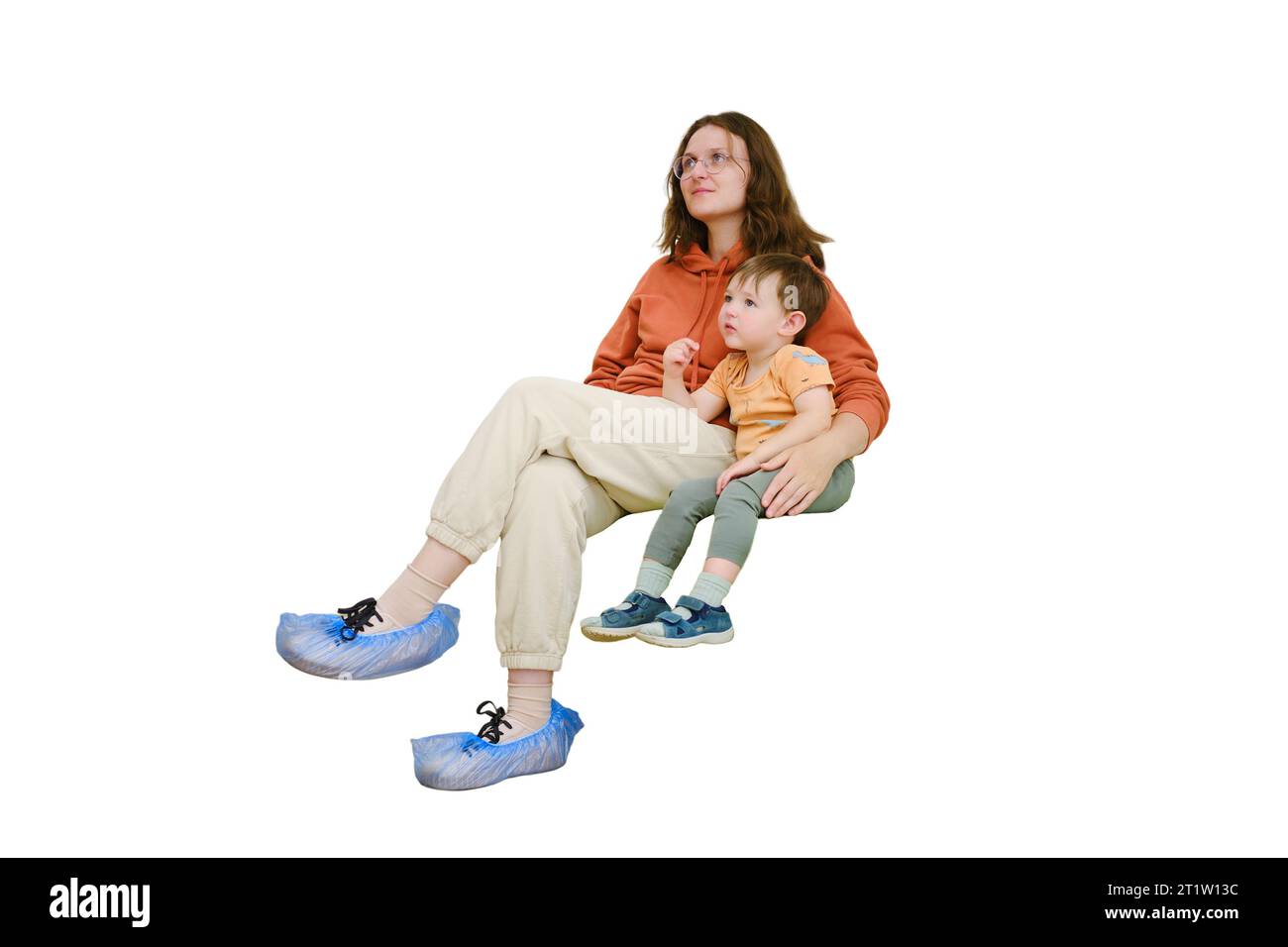 The woman and her child are in the medical waiting room as they wait ...