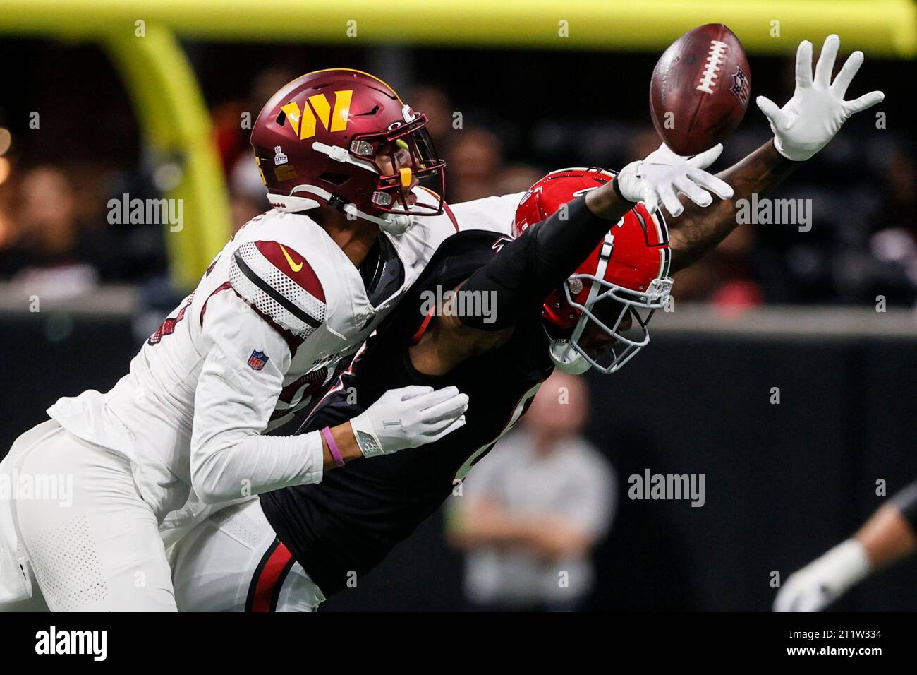 Washington Commanders cornerback Benjamin St-Juste (25) breaks up a pass intended for Atlanta ...