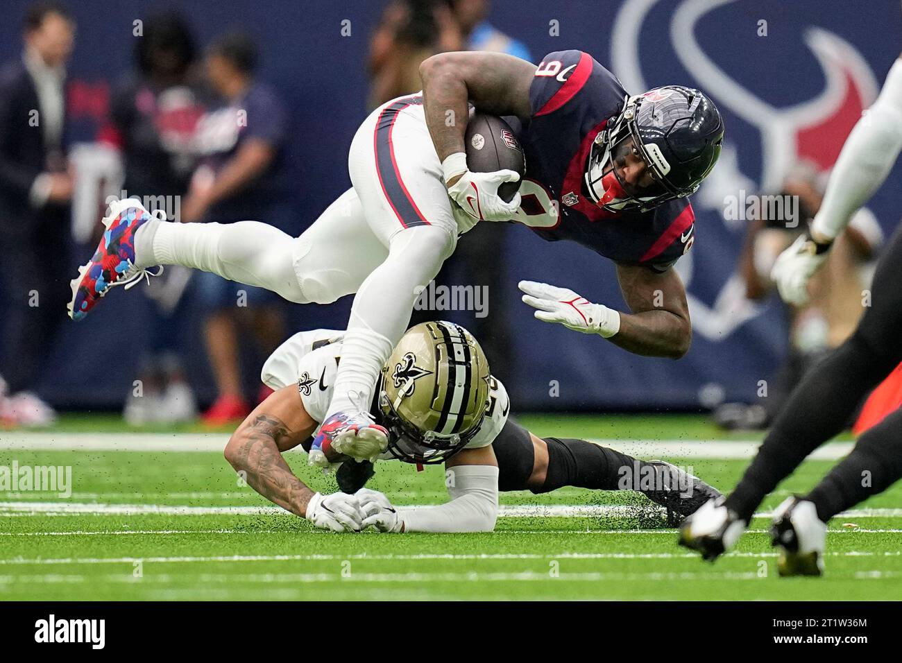 Houston Texans tight end Brevin Jordan (9) is tackled by New Orleans ...