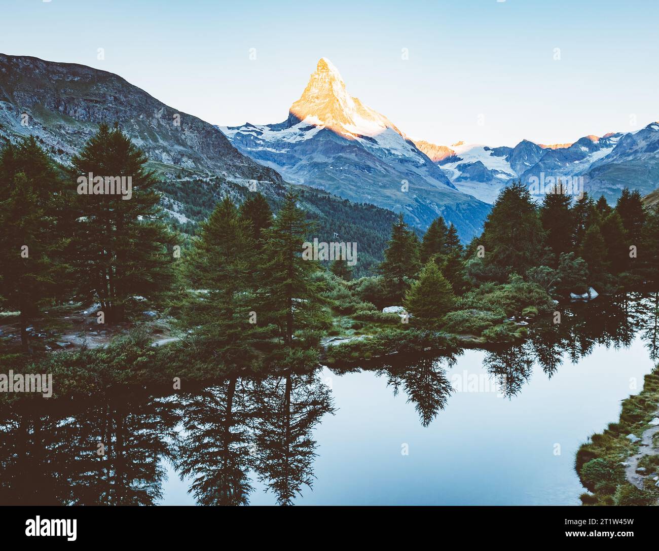 Scenic surroundings with famous peak Matterhorn in alpine valley ...