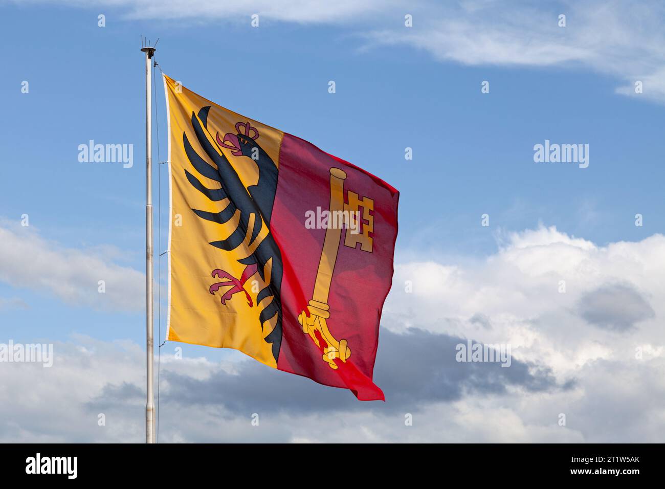 Squared flag of Geneva waving atop of its pole Stock Photo - Alamy