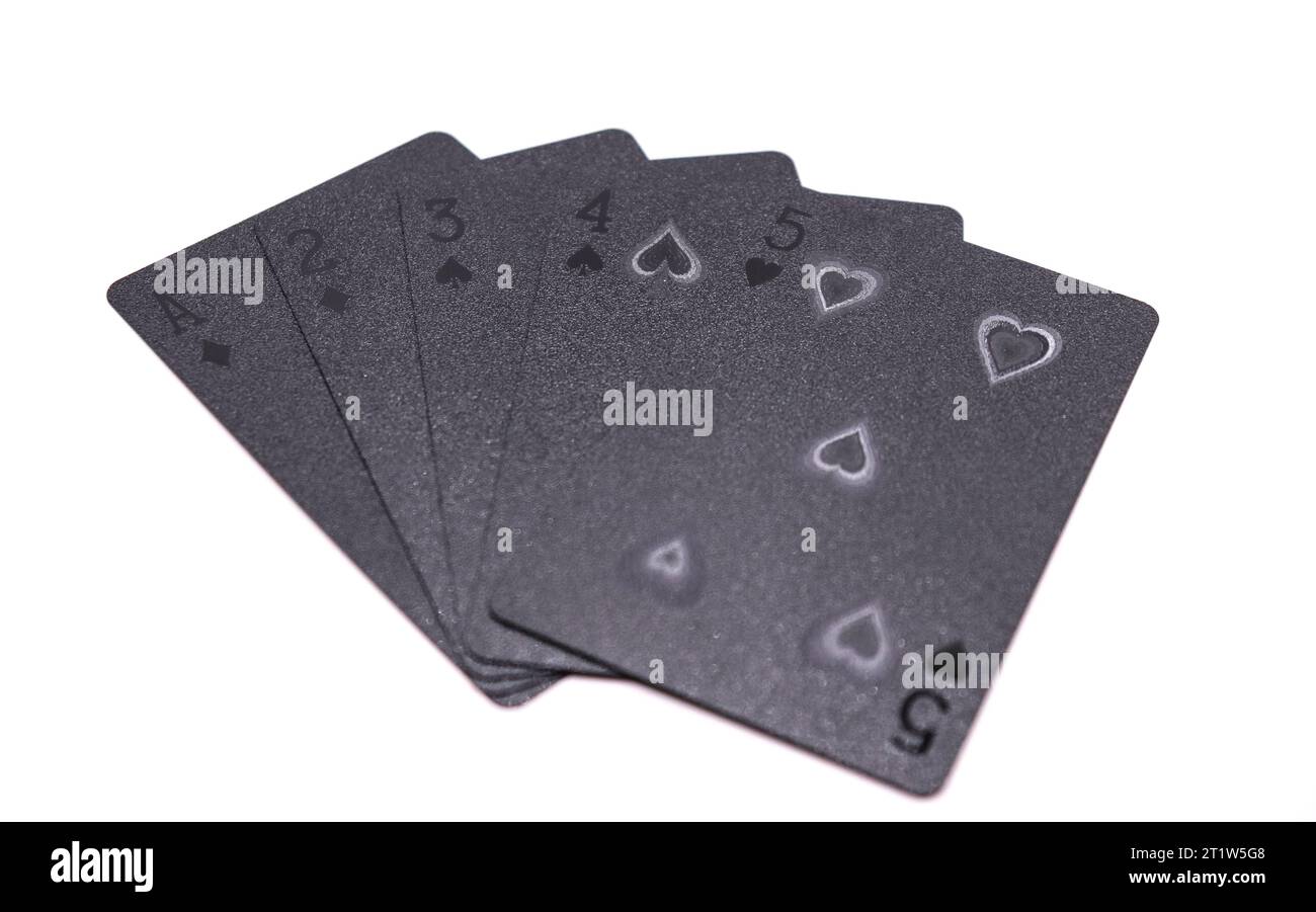 View of waterproof poker cards showing a straight Stock Photo - Alamy