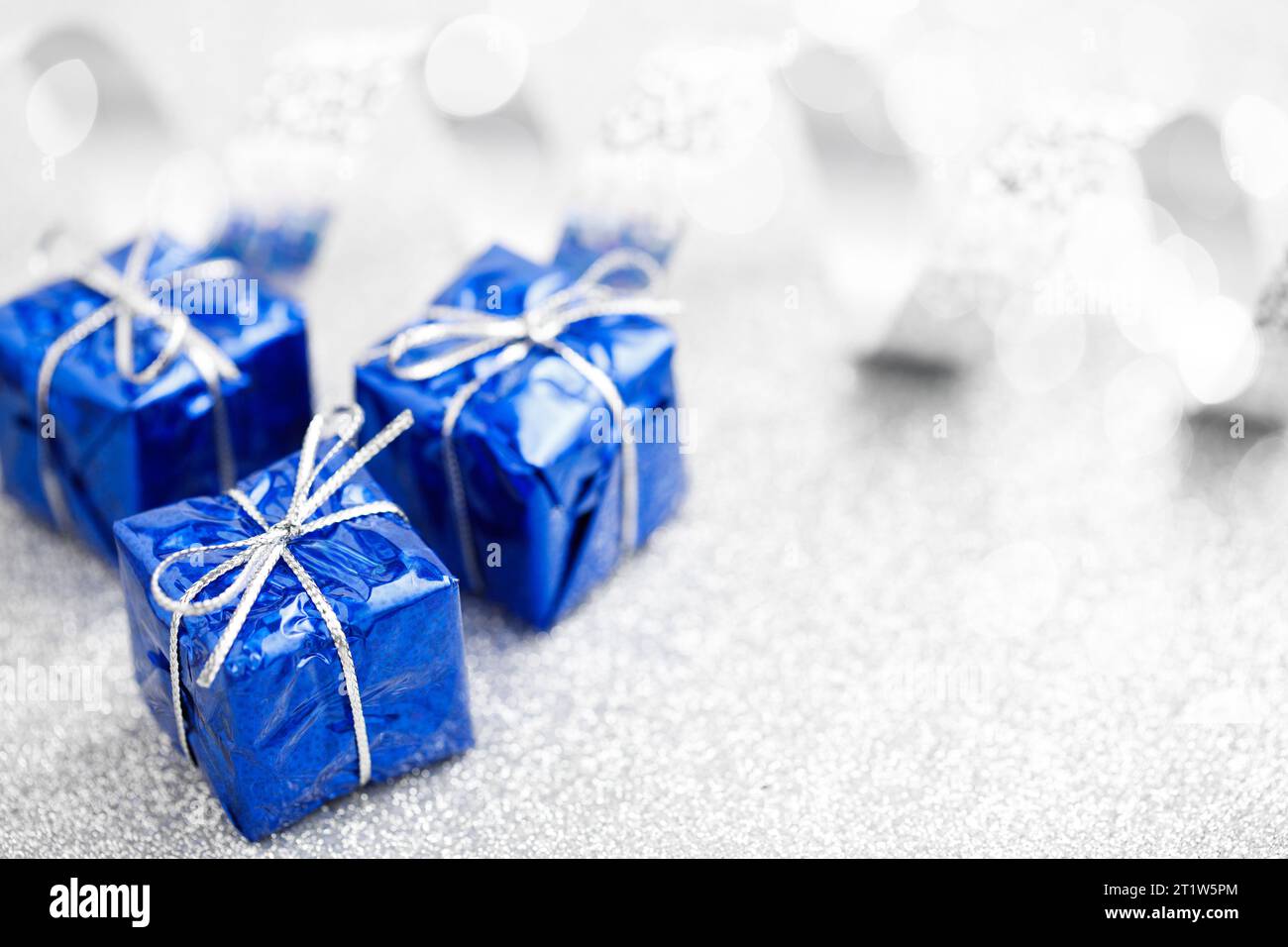 Three blue gift boxes for Christmas decoration on white background ...