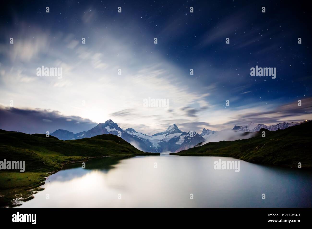 High mountain peaks glowing in the moonlight. Dramatic scene. Location ...