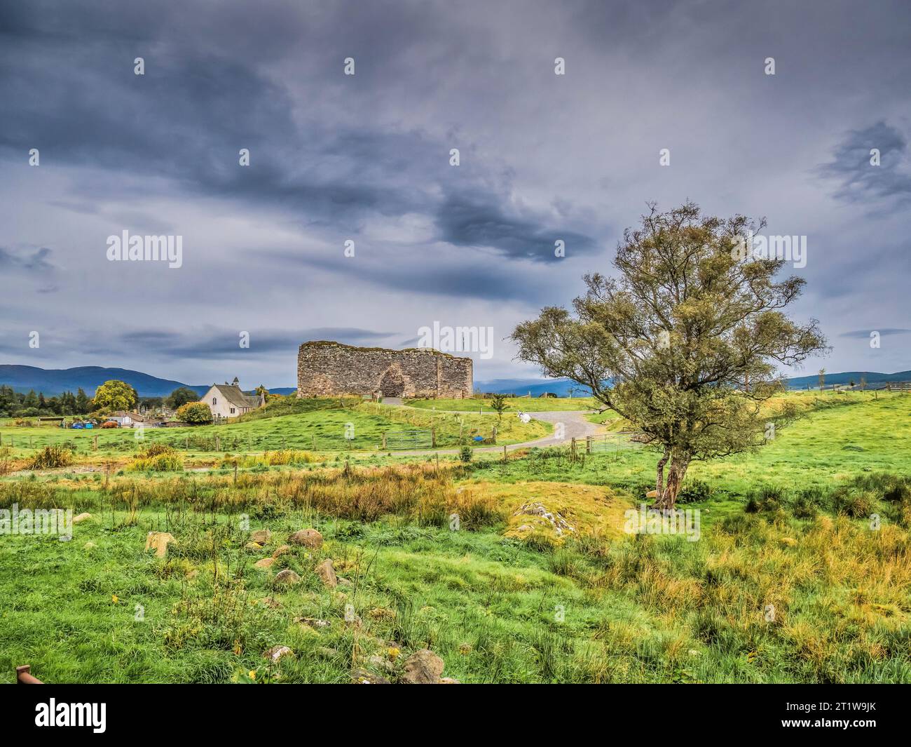 The image is of the 12th century ruin of Castle Roy fortress near the ...