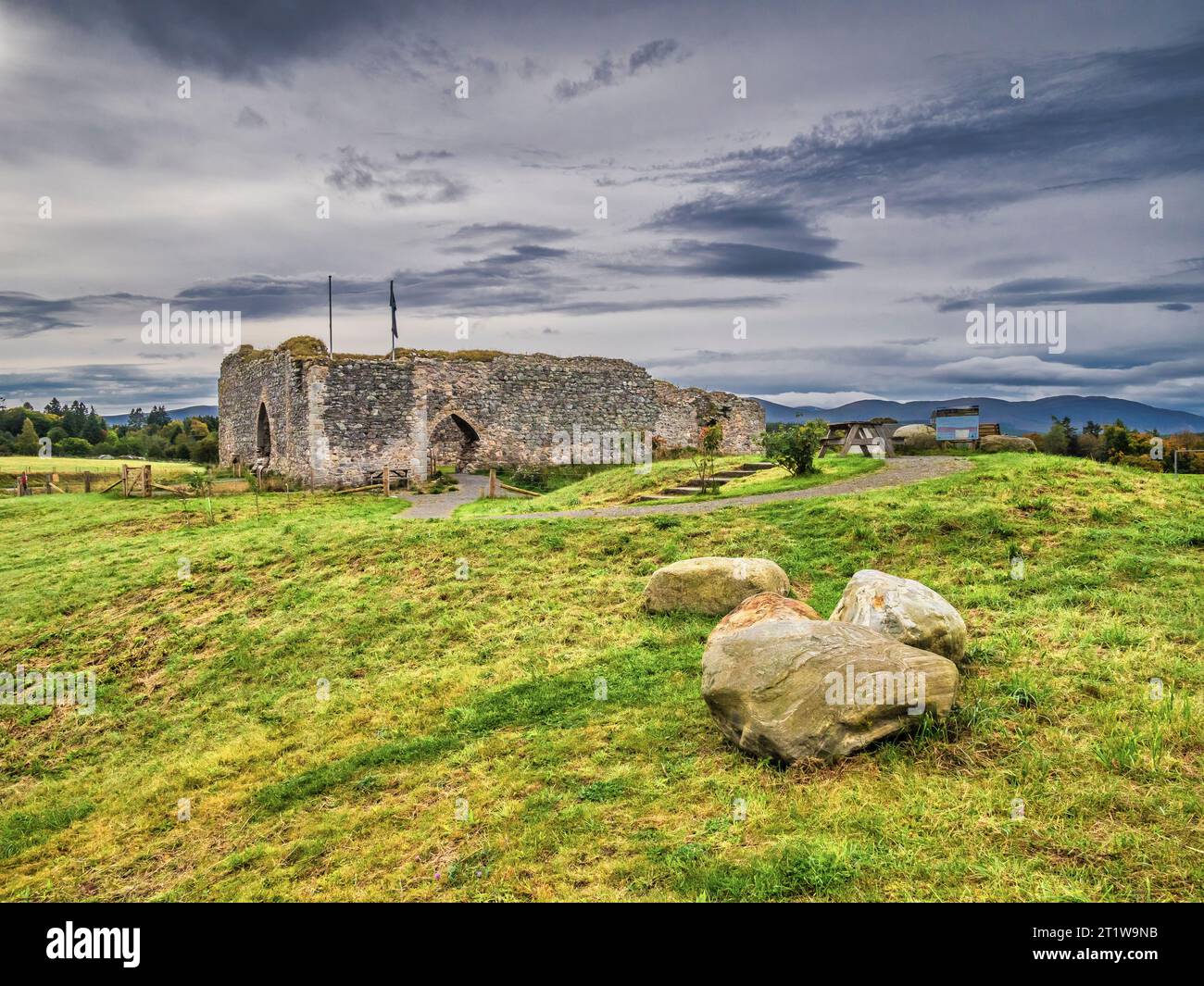 The image is of the 12th century ruin of Castle Roy fortress near the ...