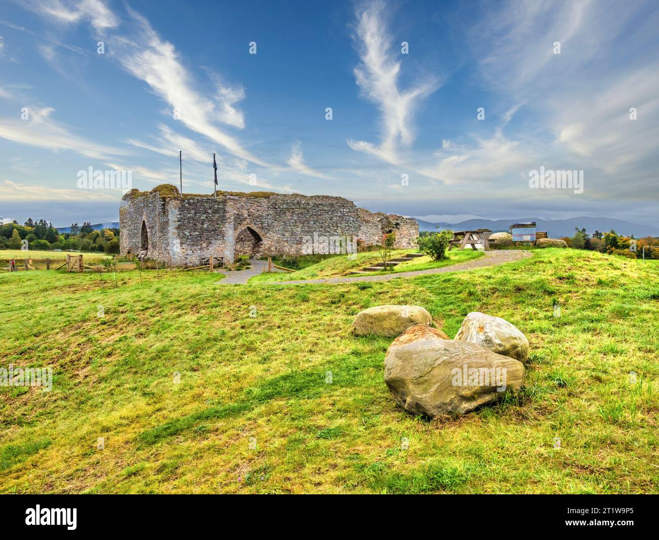 The image is of the 12th century ruin of Castle Roy fortress near the ...