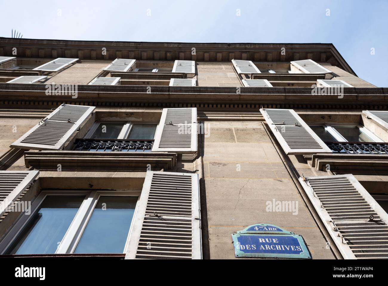 Upside perspective. Typical Parisian residential building at Rue des ...