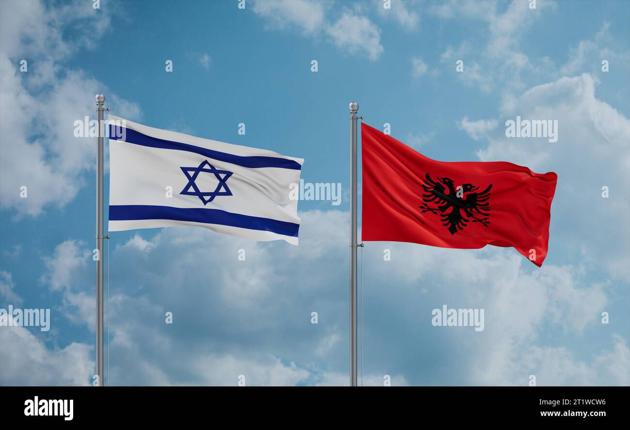 Israel and Albania flags waving together in the wind on blue cloudy sky ...