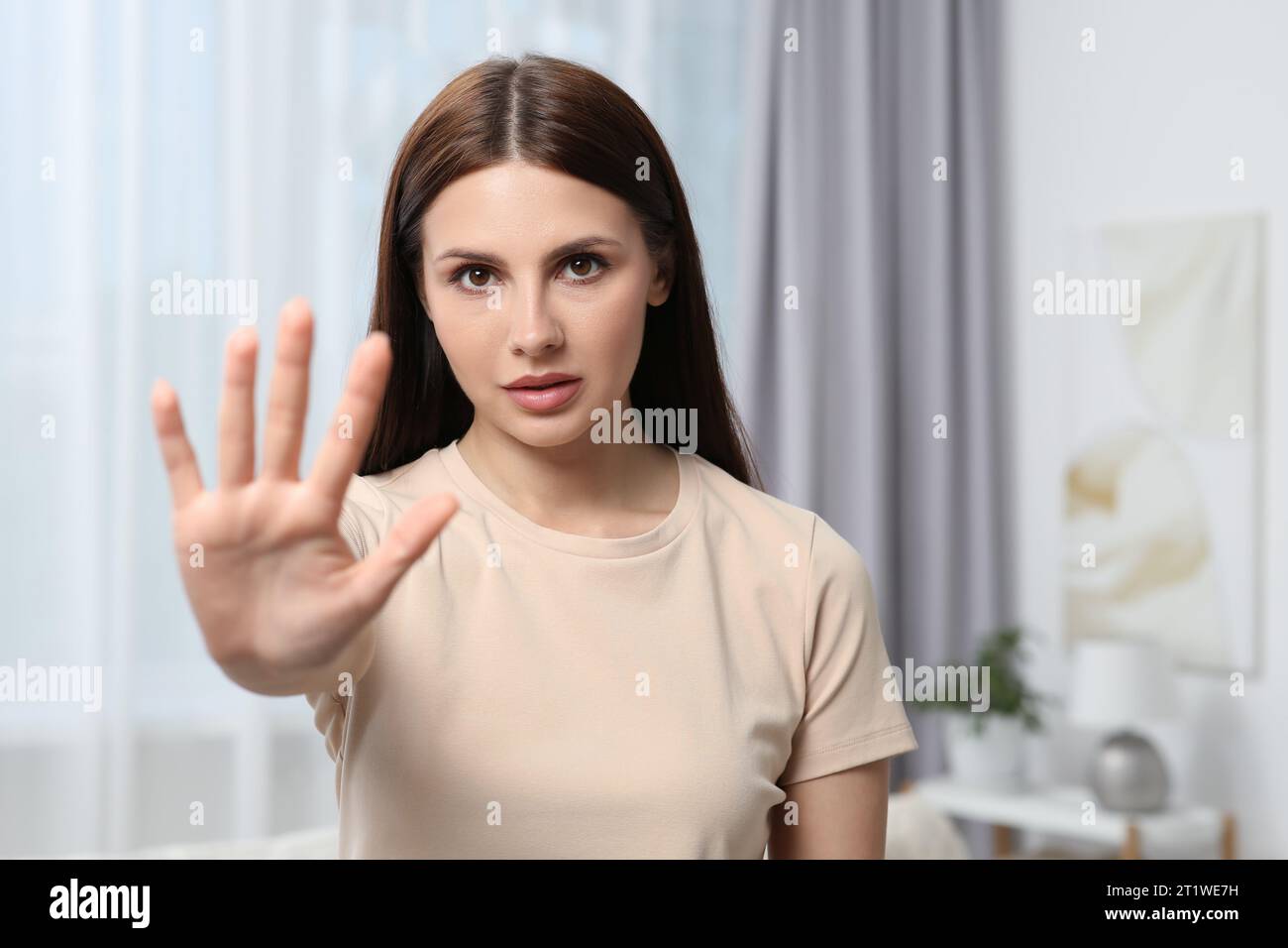 Woman showing disapproval indoors hi-res stock photography and images ...