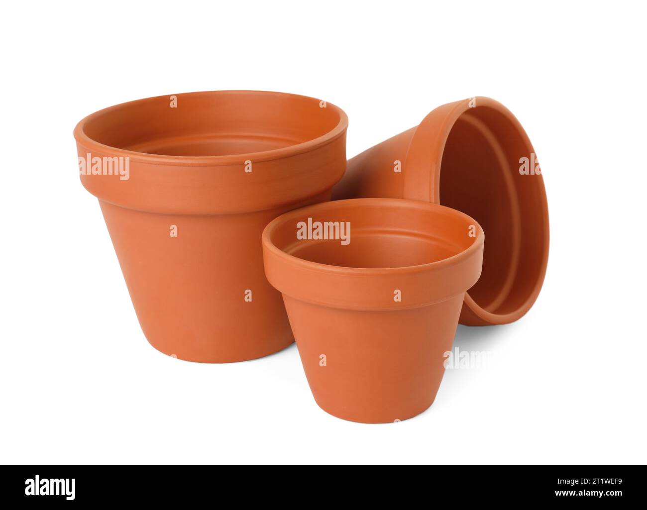 Empty clay flower pots isolated on white Stock Photo - Alamy