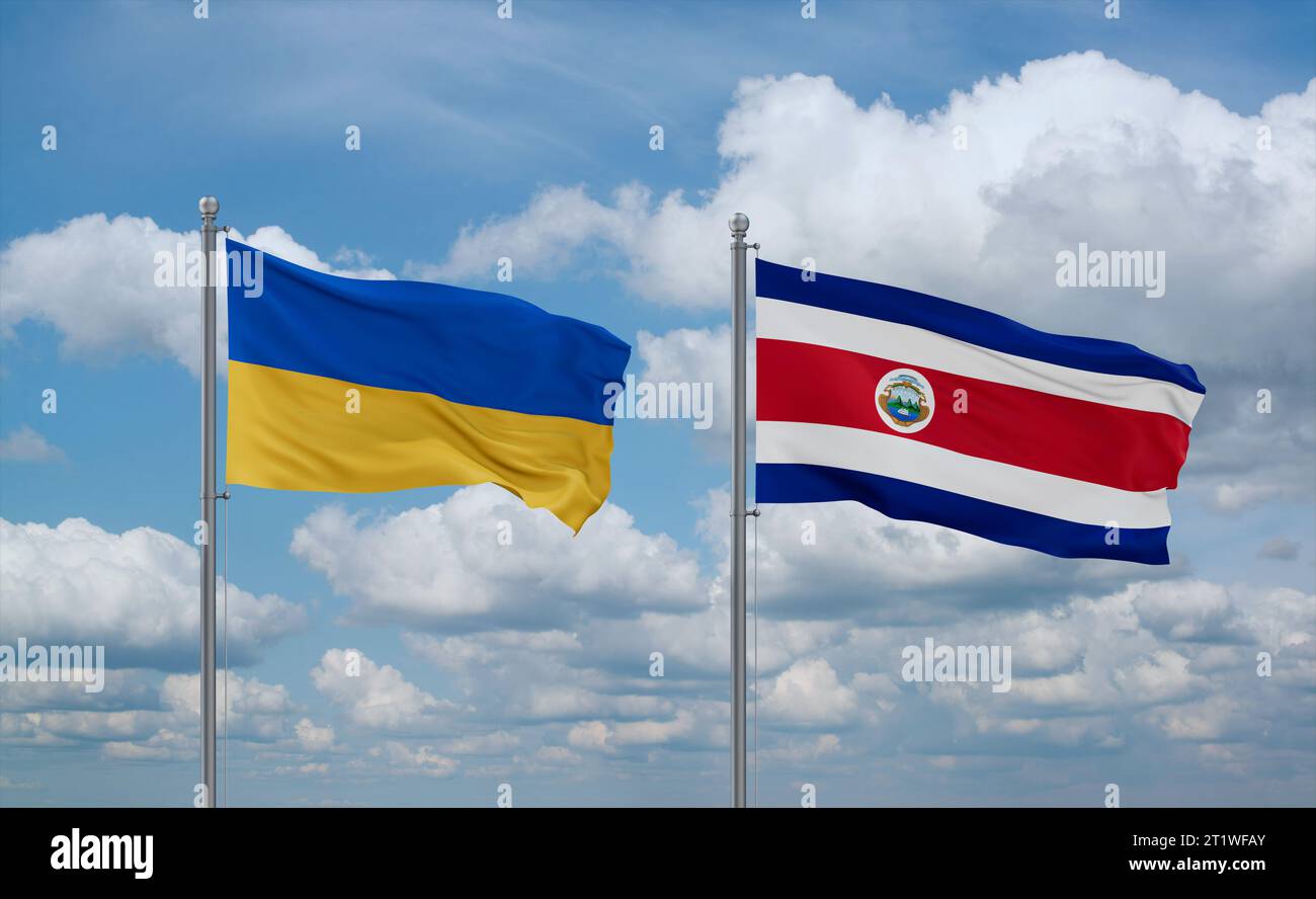 Costa Rico and Ukraine flags waving together in the wind on blue cloudy ...