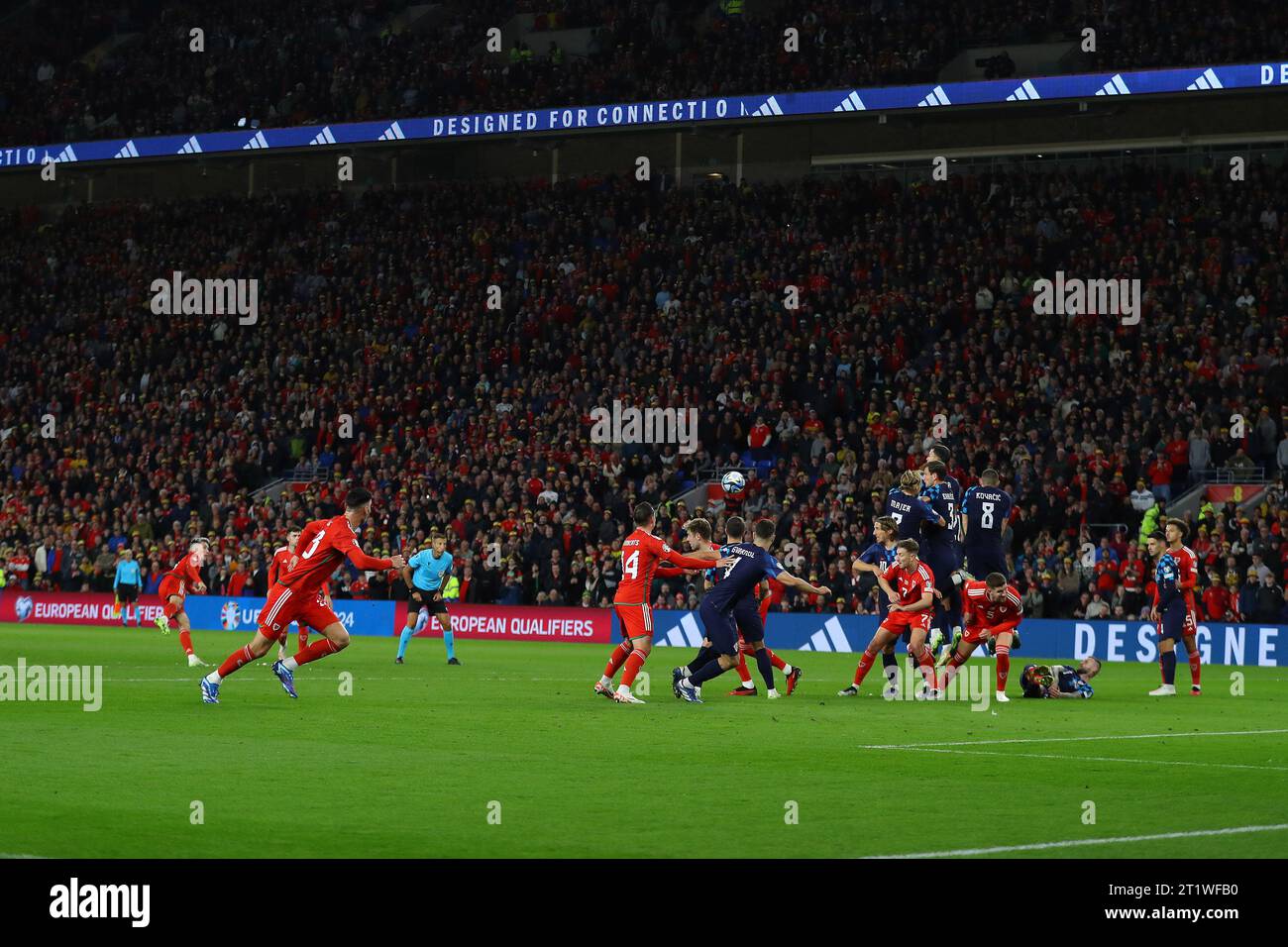 Cardiff, UK. 15th Oct, 2023. Harry Wilson of Wales (l) has a free-kick ...