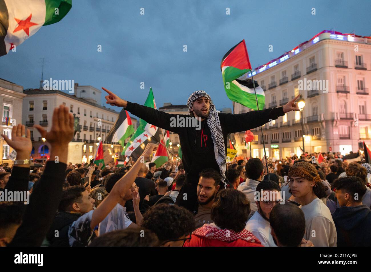 Madrid, Spain. 15th Oct, 2023. Protesters shouting slogans while waving ...
