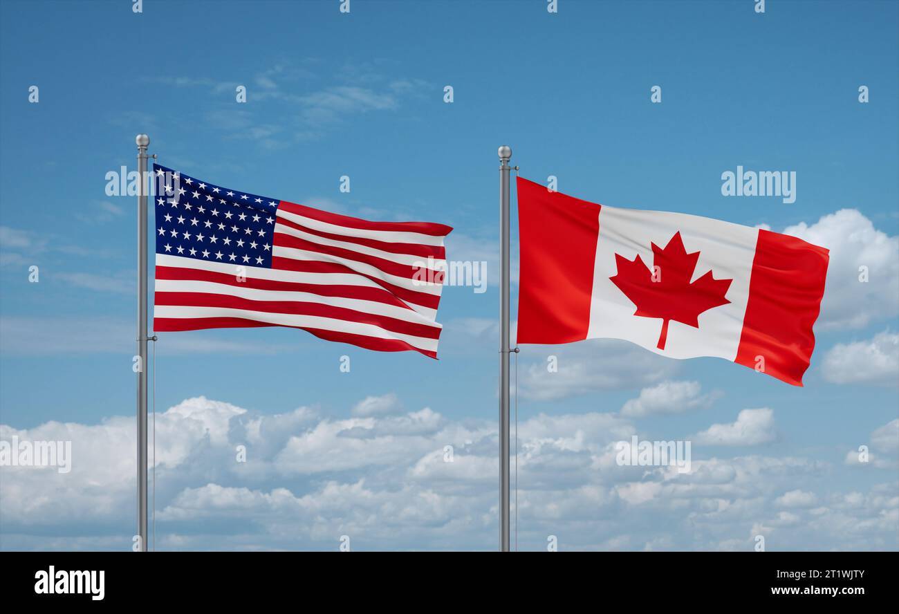 Canada and USA flags waving together in the wind on blue cloudy sky ...
