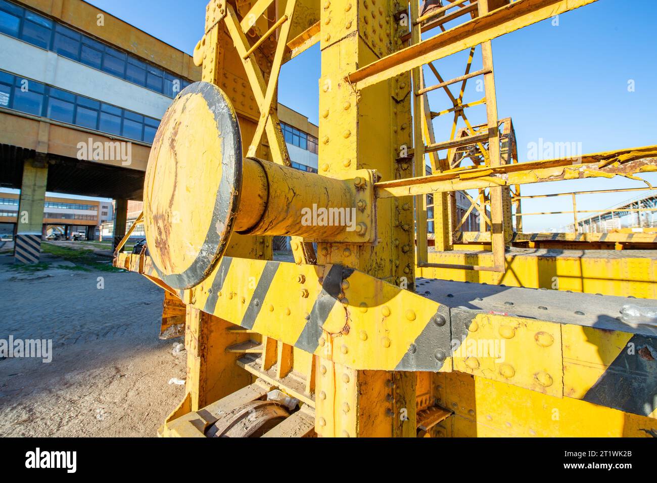 Inside the ruins of an old factory in Romania of a Communist Era. Step ...