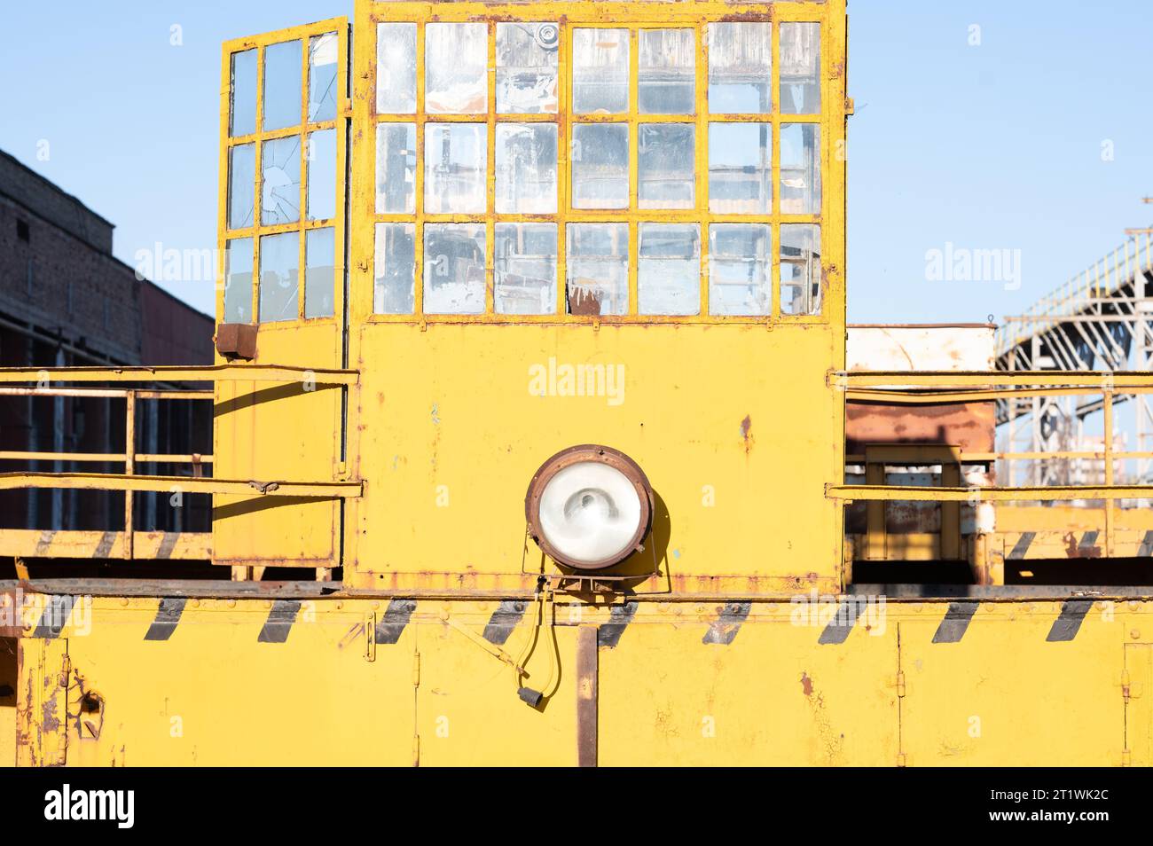 Inside the ruins of an old factory in Romania of a Communist Era. Step ...