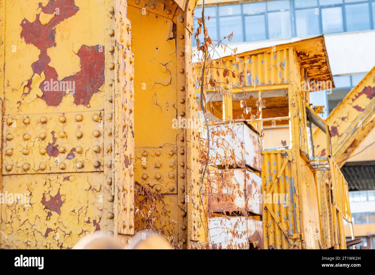 Inside the ruins of an old factory in Romania of a Communist Era. Step ...