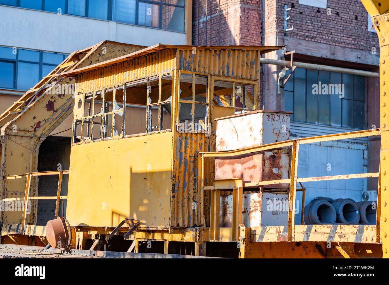 Inside the ruins of an old factory in Romania of a Communist Era. Step ...