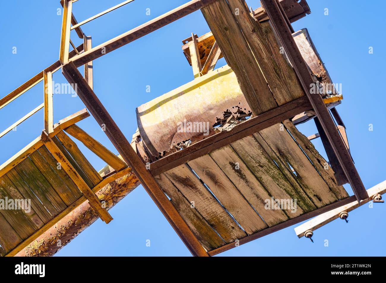 Inside the ruins of an old factory in Romania of a Communist Era. Step ...