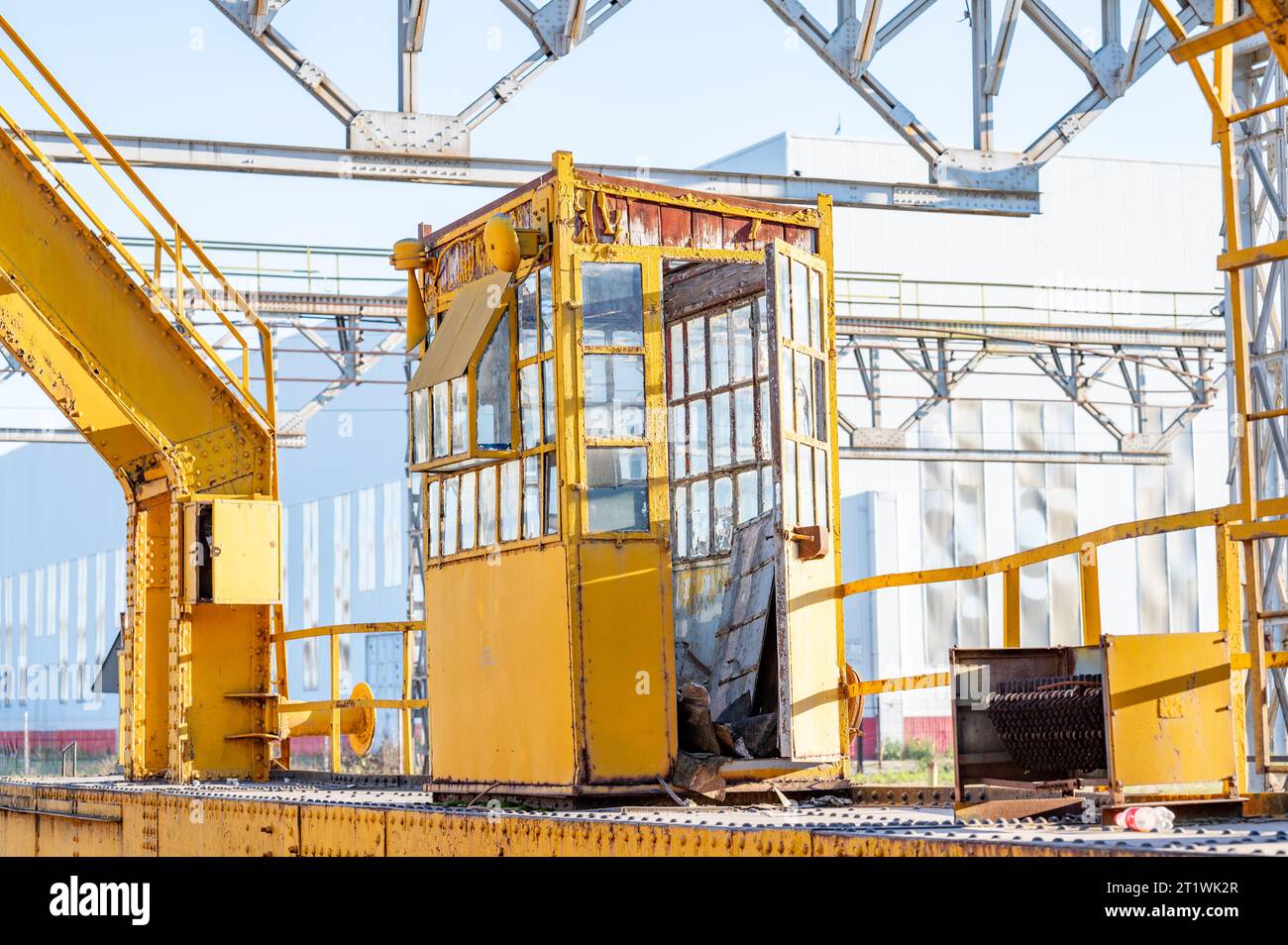 Inside the ruins of an old factory in Romania of a Communist Era. Step ...