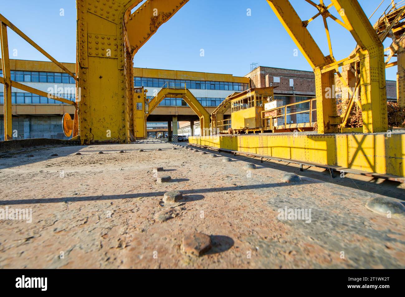 Inside the ruins of an old factory in Romania of a Communist Era. Step ...