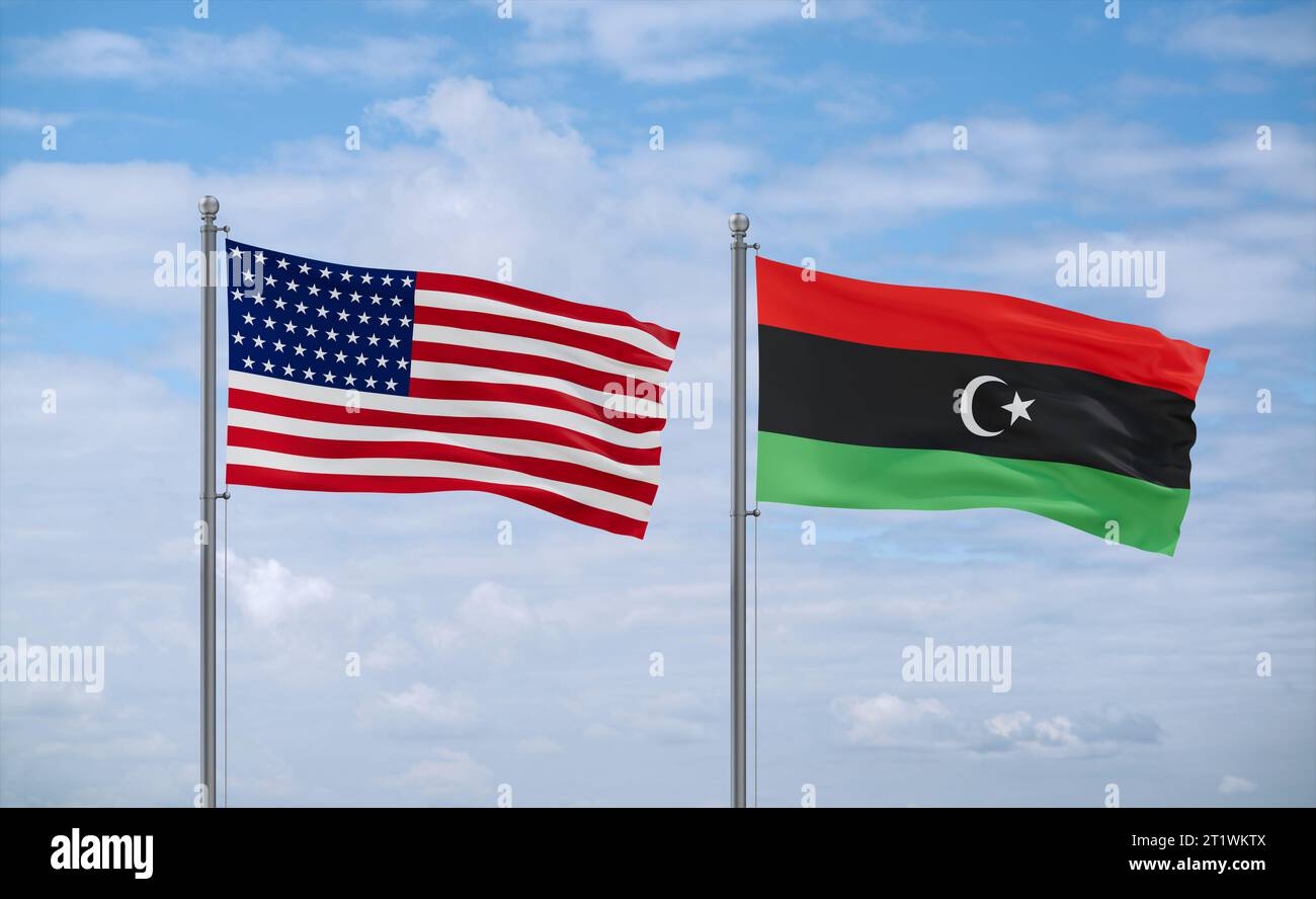 Libya and USA flags waving together in the wind on blue cloudy sky, two ...