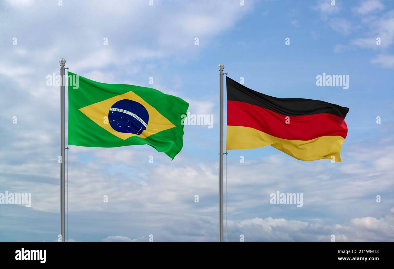 Germany and Brazil flags waving together on blue cloudy sky, two ...