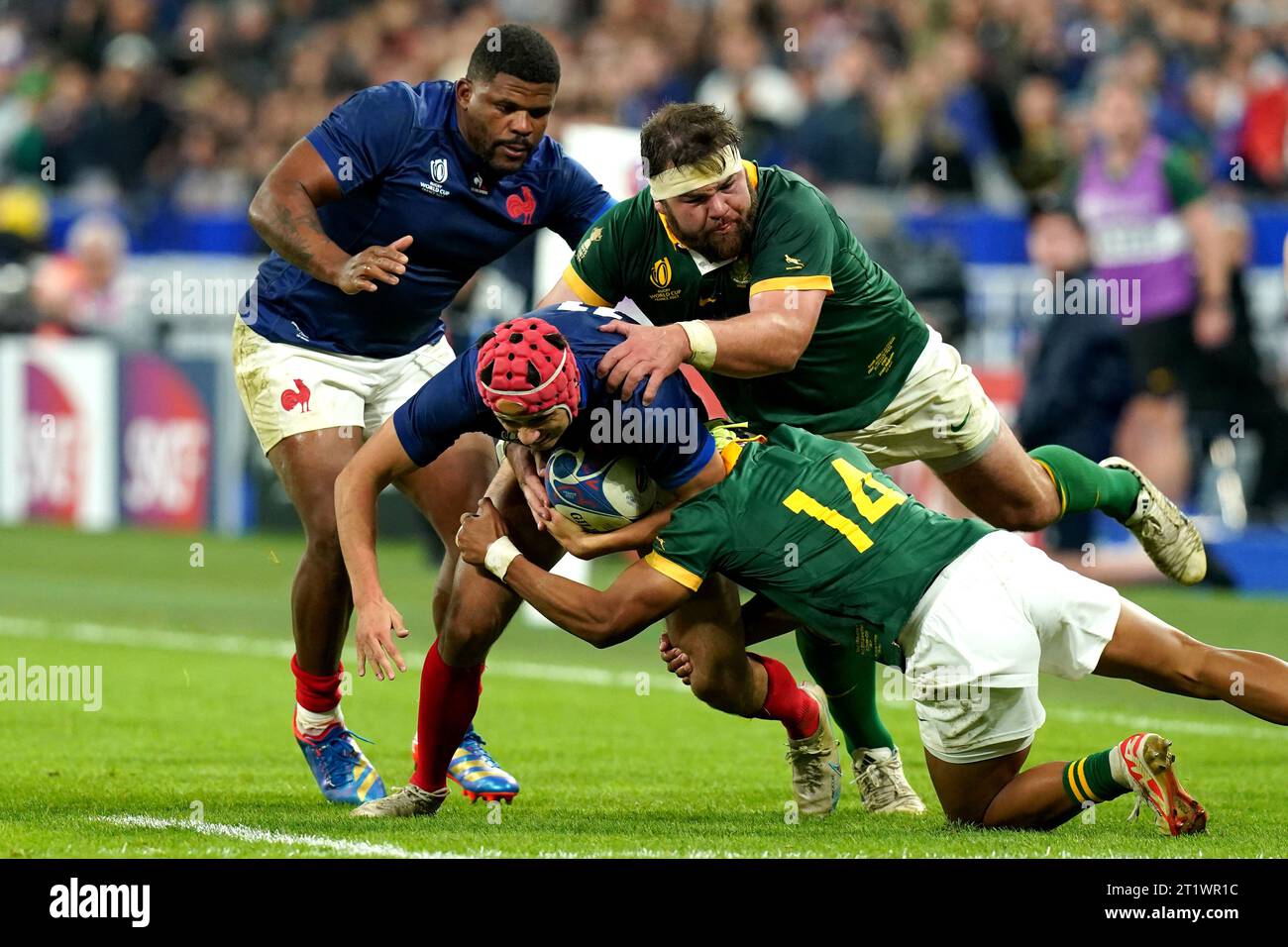France's Louis Bielle-Biarrey is tackled during the Rugby World Cup ...