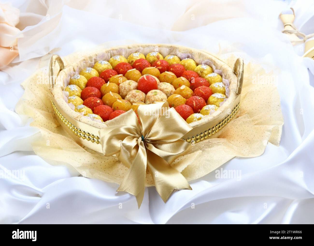 Indian or Bangladeshi decorative sweets Dala. variety of laddu in ...