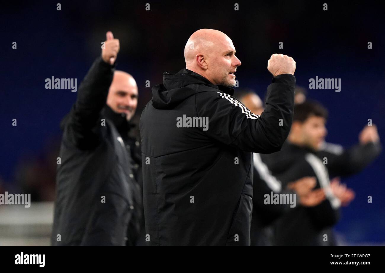 Wales manager Rob Page celebrates and applauds the fans after the final ...