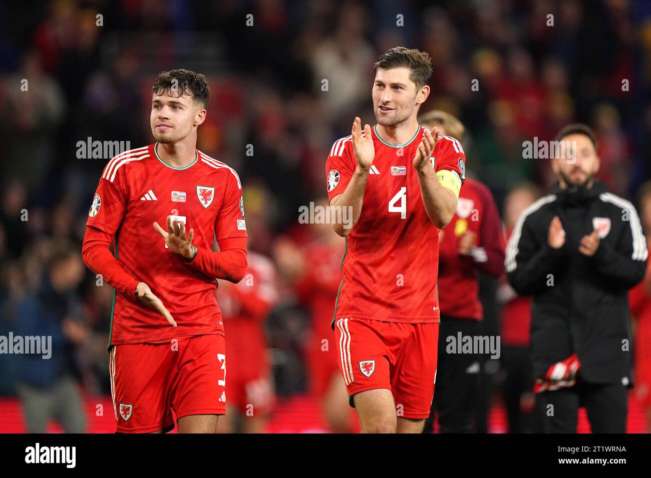 Wales' Ben Davies (right) and Neco Williams applaud the fans after the ...