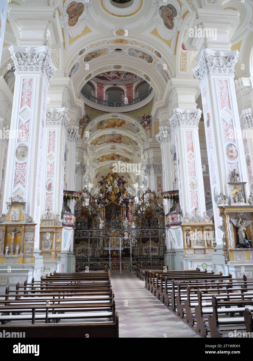 View of the chancel with red carpet and high altar with large picture ...
